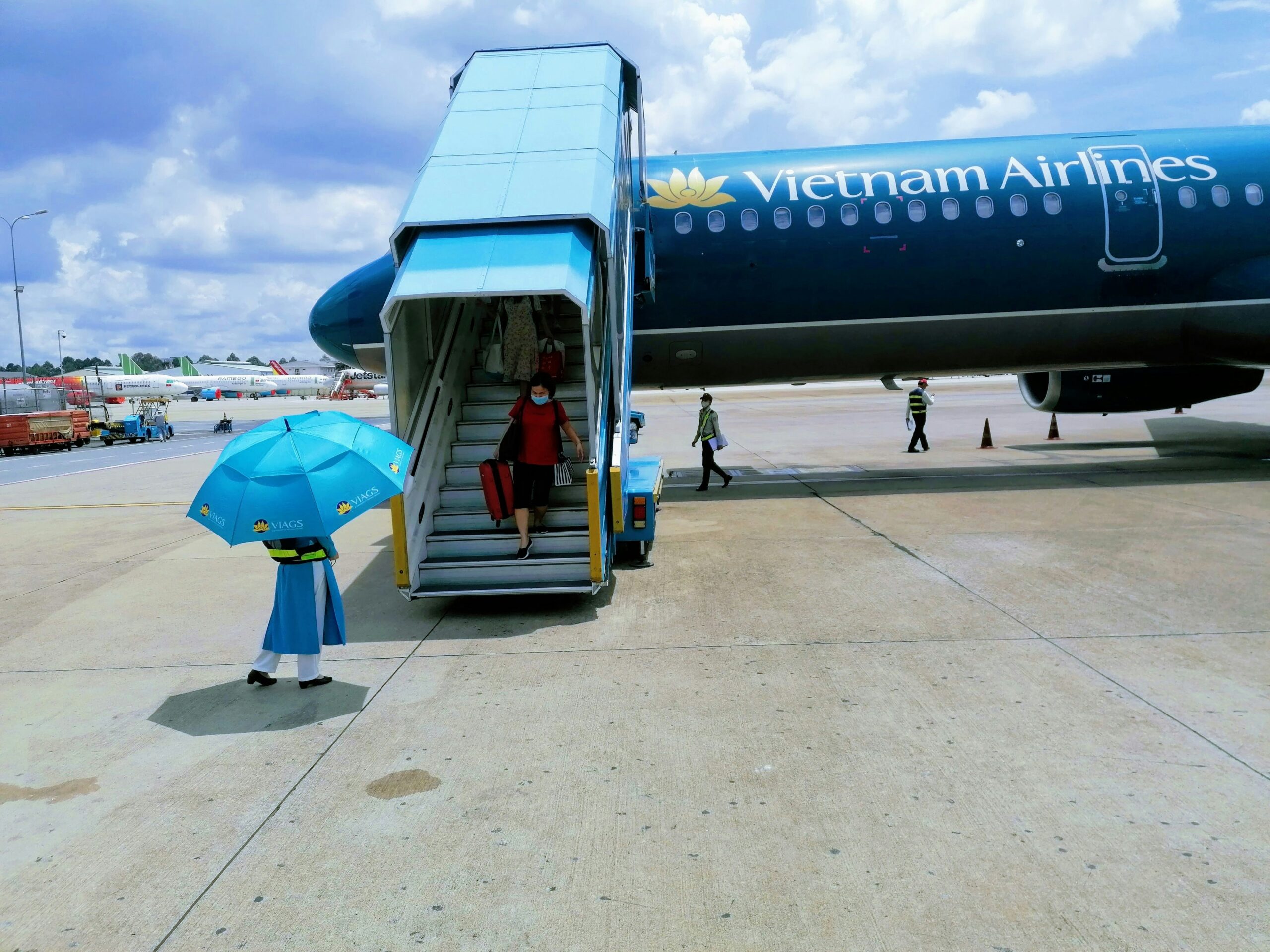 Fast Track at Vietnam Airports: Control Time, Not Queues